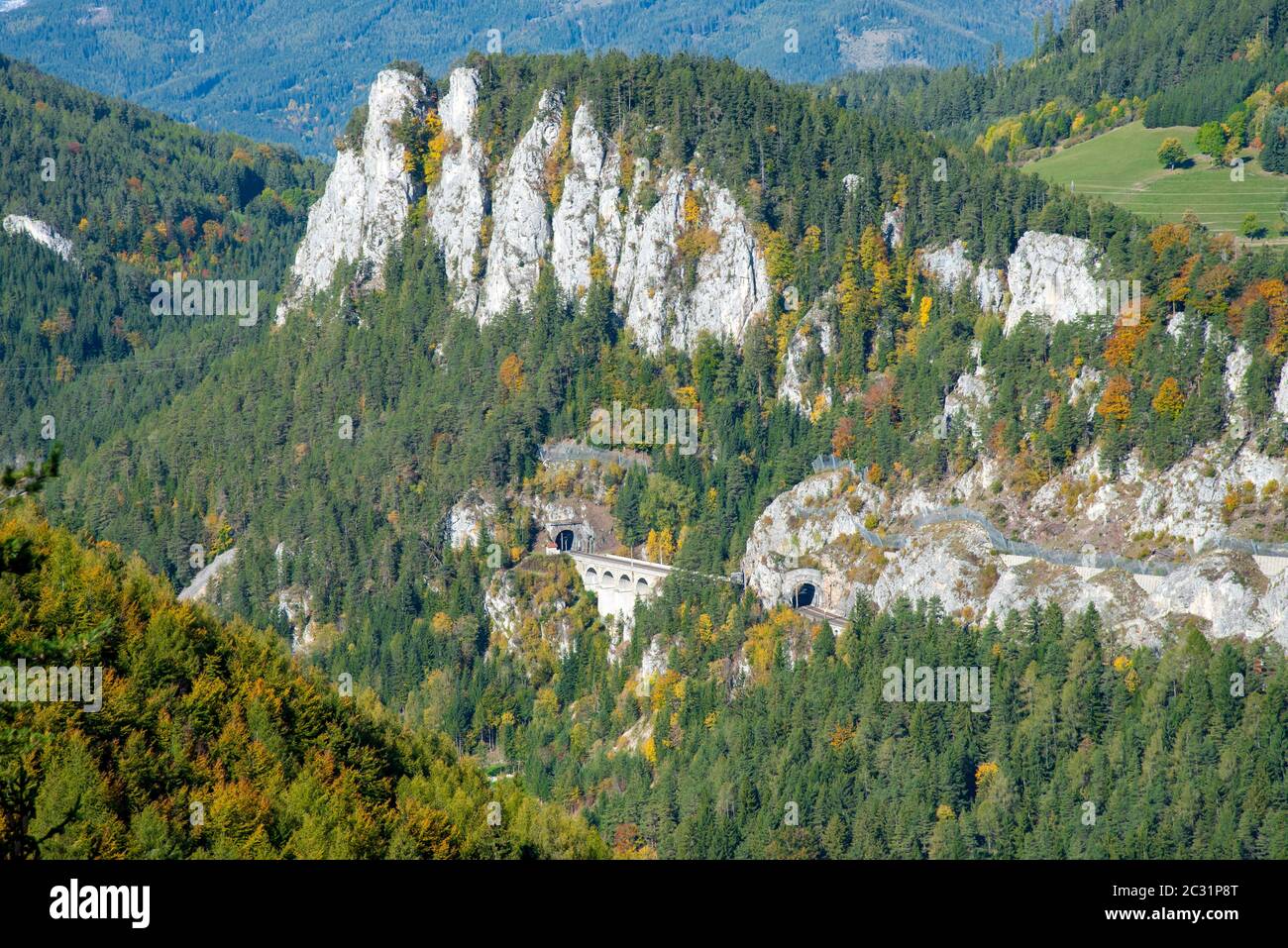Viaduct and tunnel on the Semmering Railway. The Semmering Railway is ...