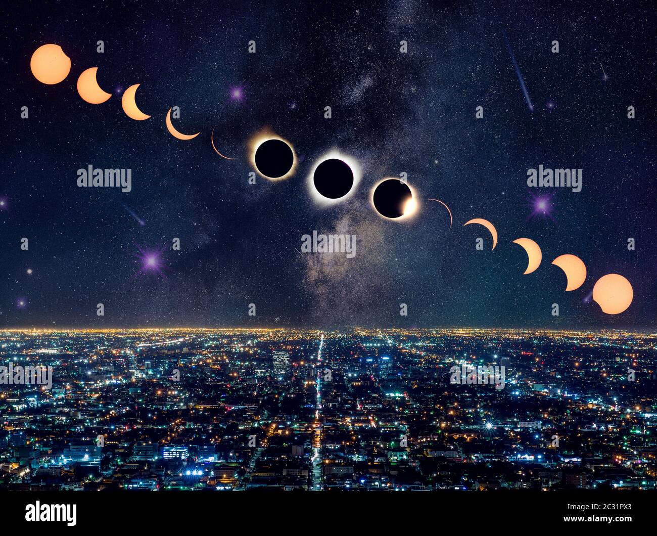 Aerial view of city against scenic sky during solar eclipse Stock Photo ...