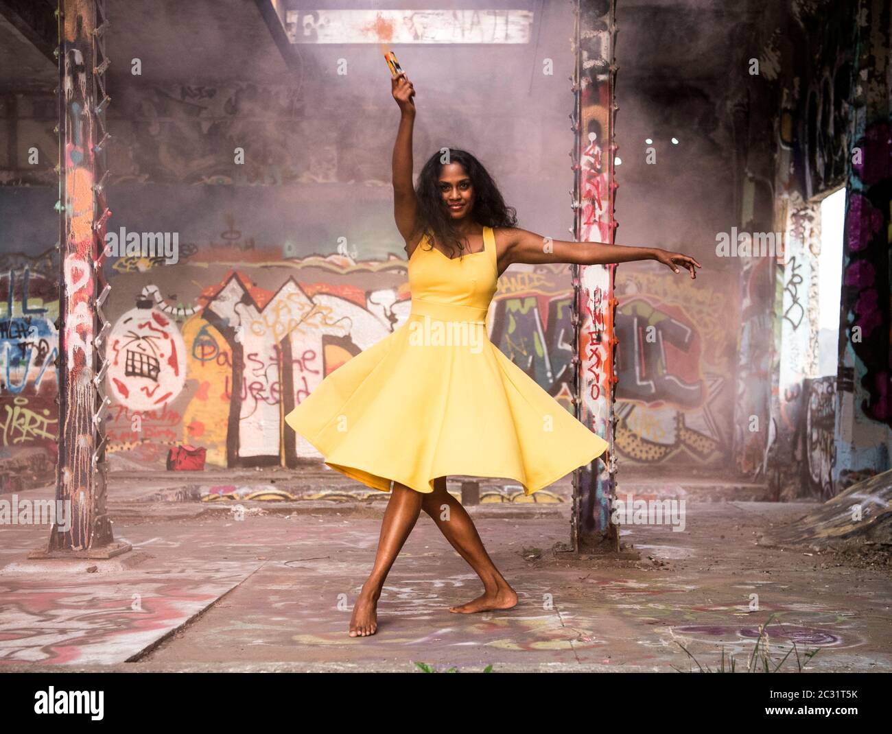 Beautiful woman in dress dancing hi-res stock photography and images ...