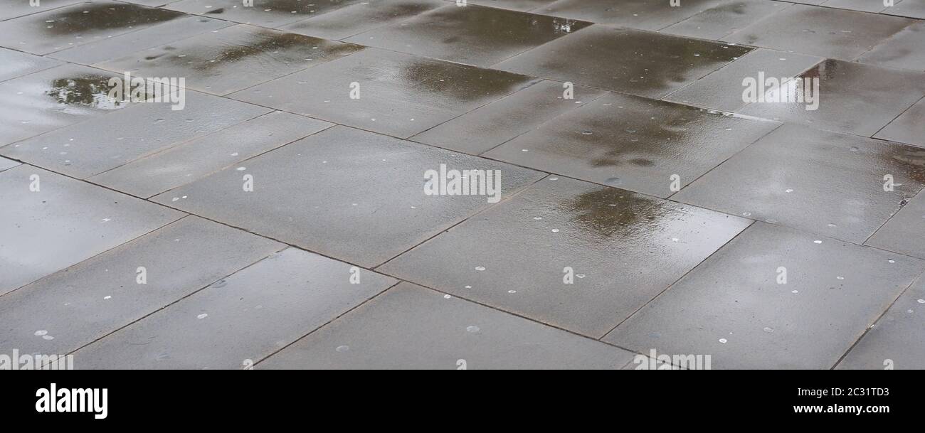 wide wet pavement useful as a background with copy space Stock Photo ...