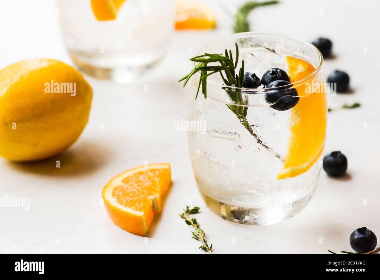 Infused water mix of orange and blueberry Stock Photo - Alamy
