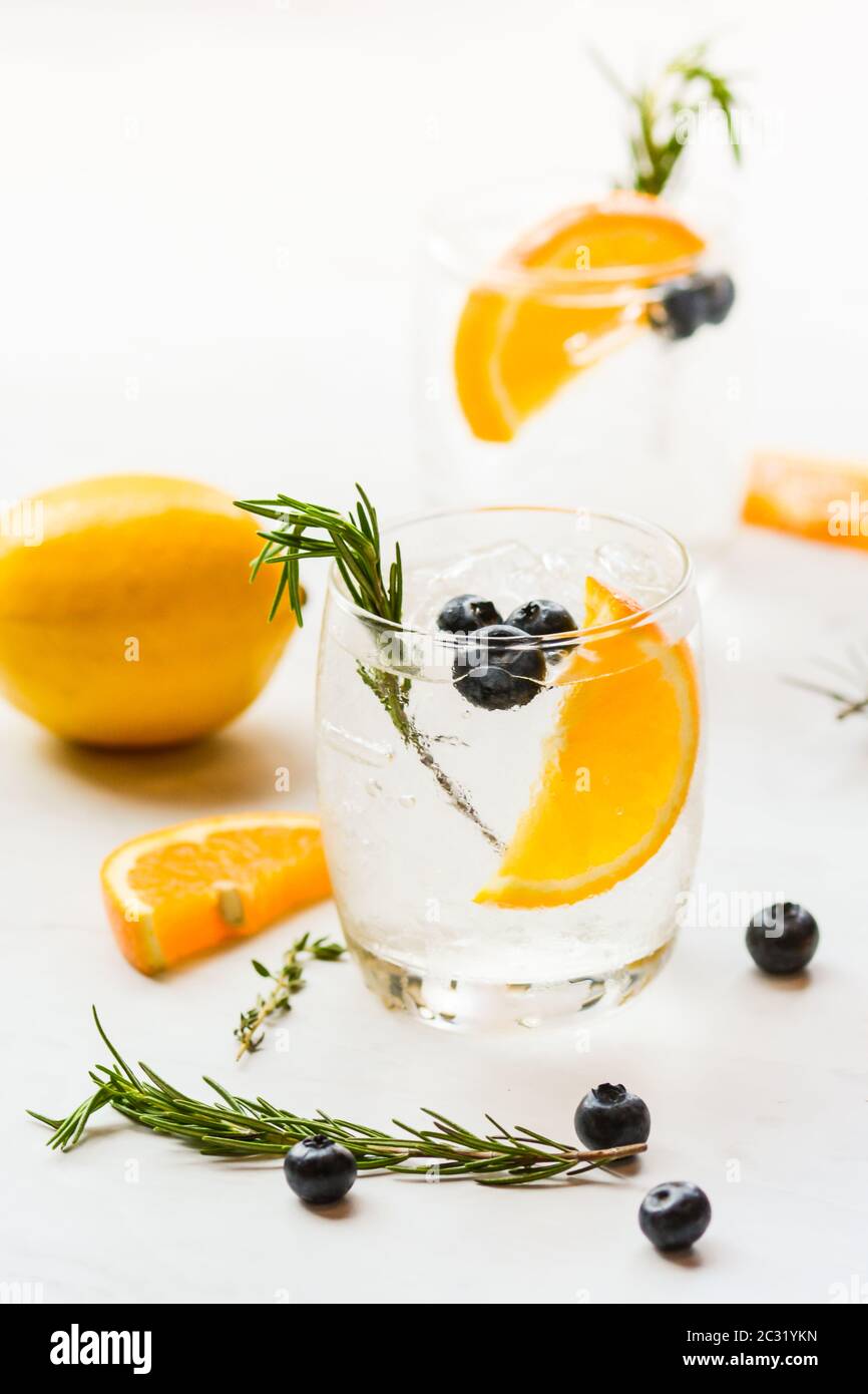 Infused water mix of orange and blueberry Stock Photo - Alamy