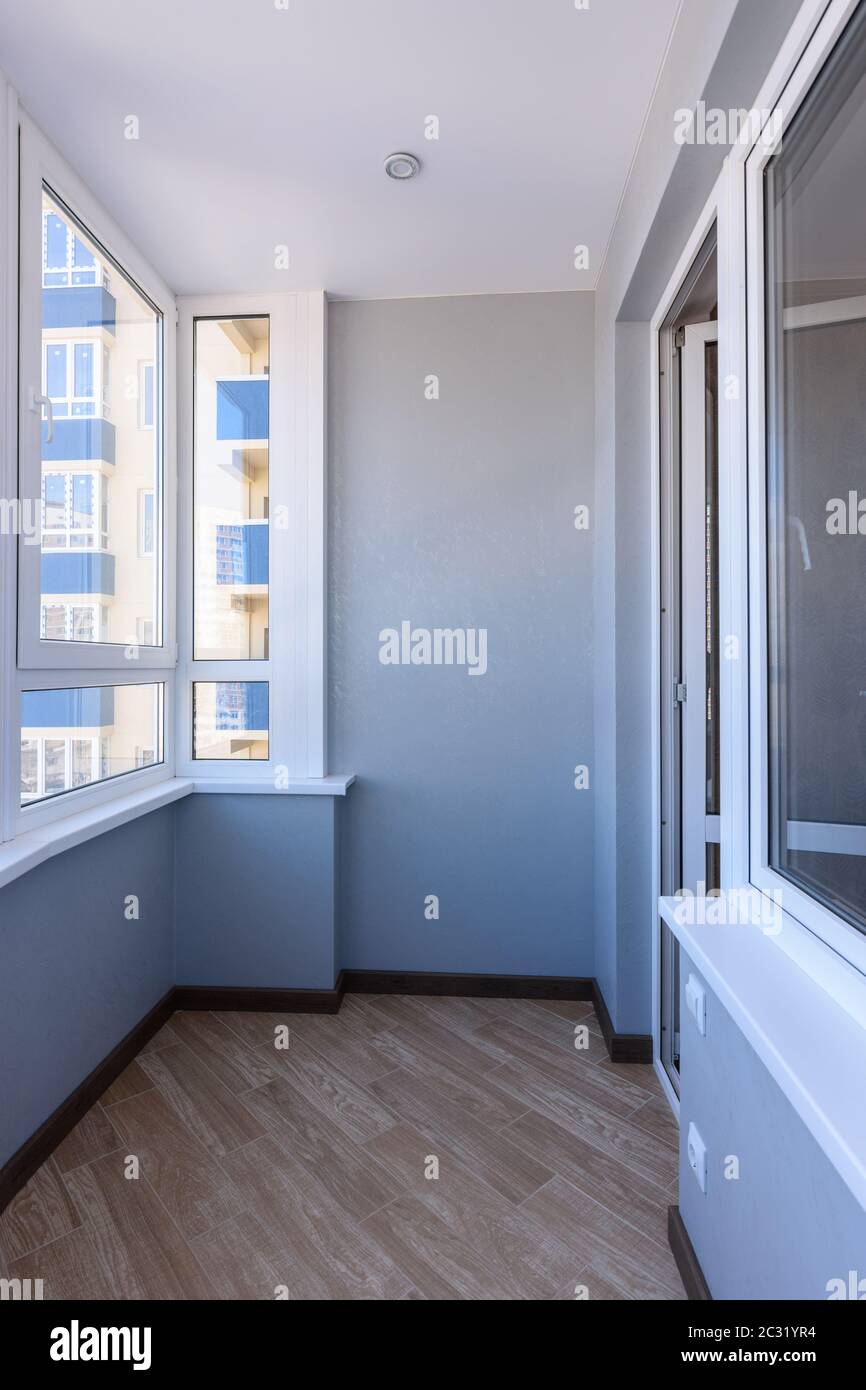 Interior of a spacious empty balcony after renovation Stock Photo - Alamy