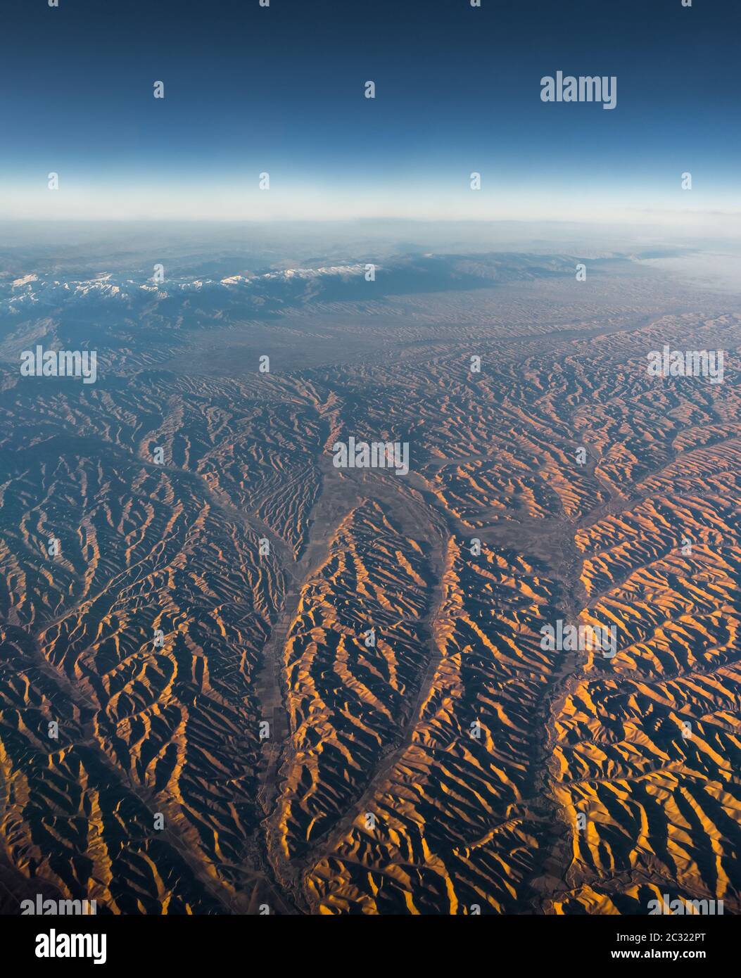 Aerial View from an Airplane. Flying above Beautiful Land at Sunrise ...
