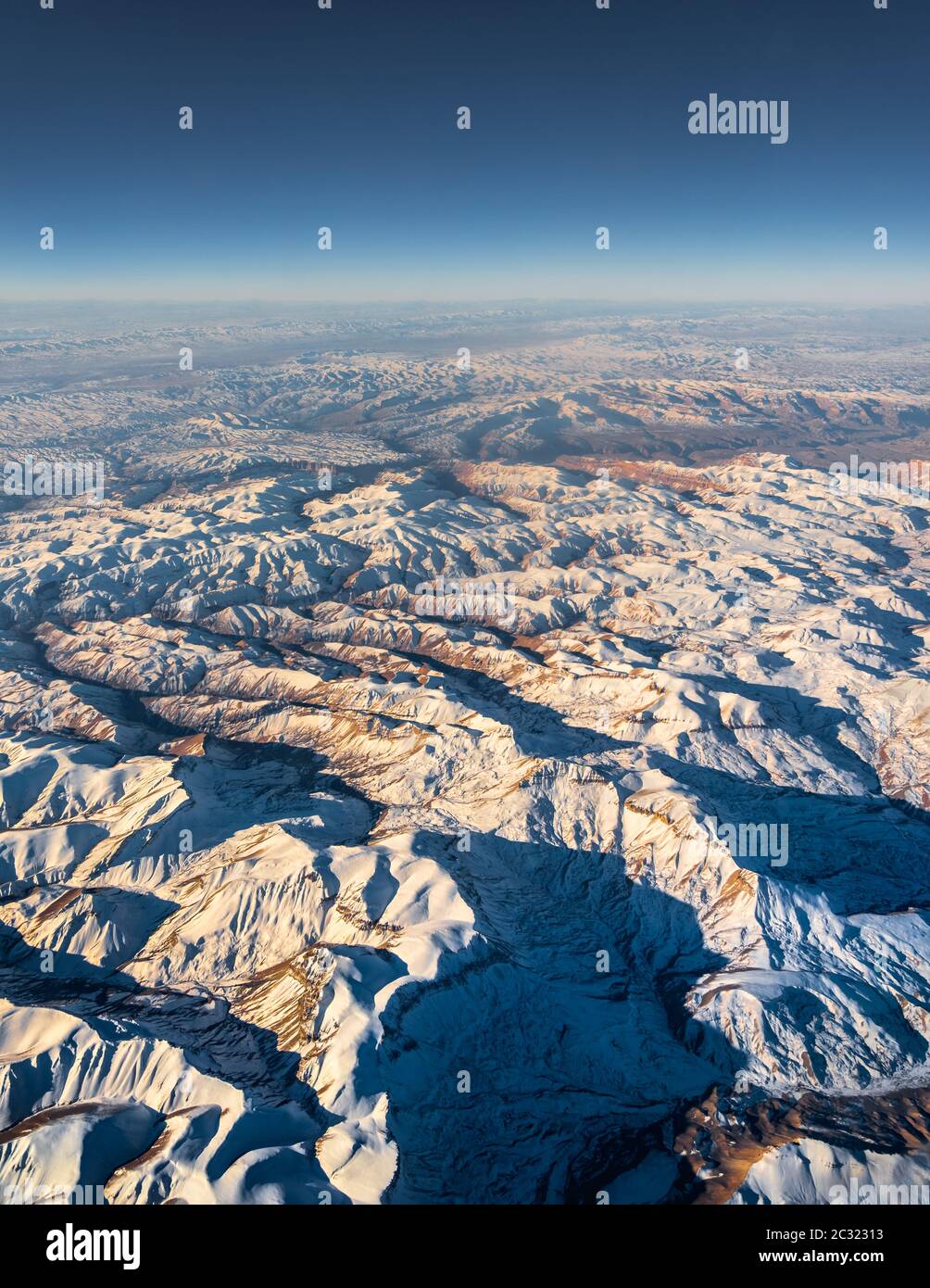 Aerial View from an Airplane. Flying above Beautiful Land at Sunrise ...