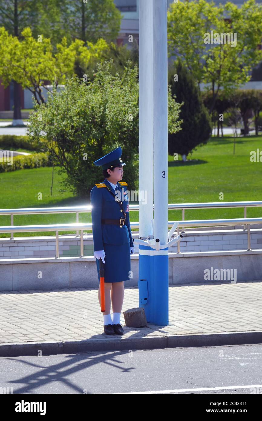 Pyongyang, North Korea - May 2, 2019: Traffic girl regulates traffic at ...