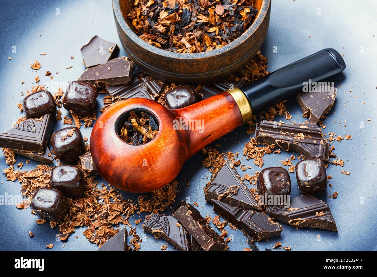 Chocolate flavored tobacco for smoking pipes.Tobacco pipe filled with ...