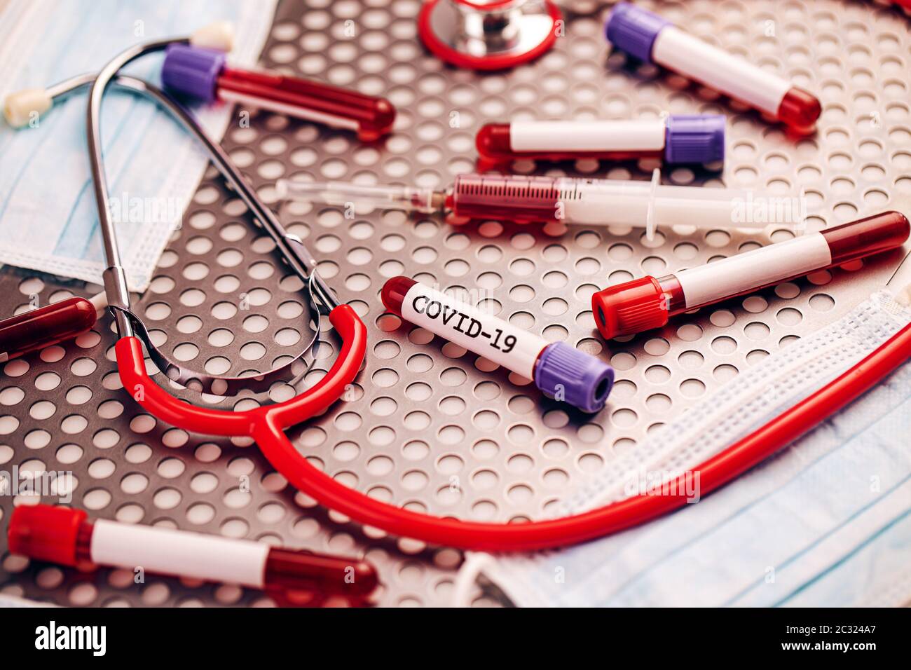 Blood test of covid-19 concept. Blood sample, stethoscope, syringe and ...