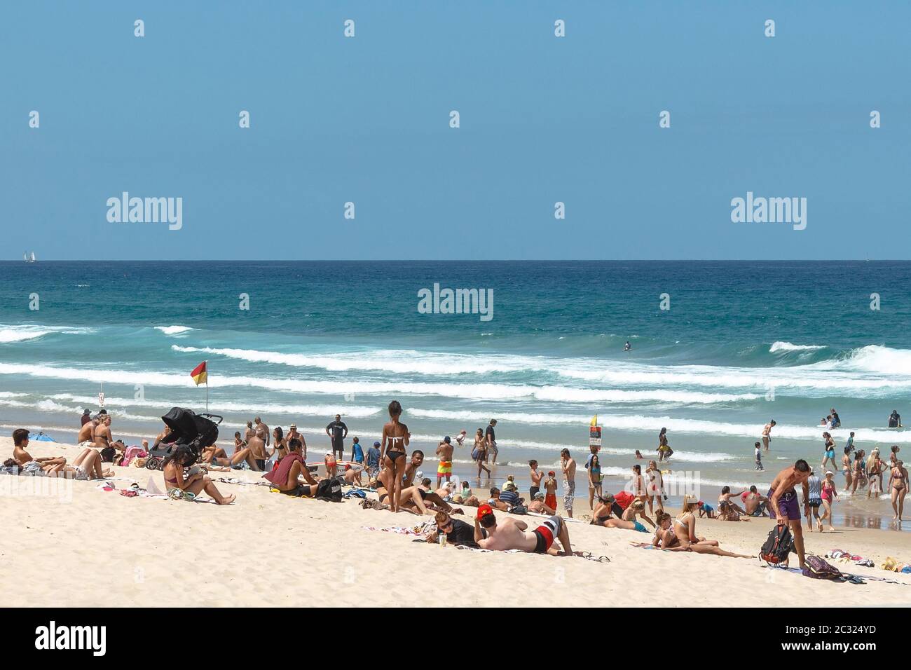 People enjoying the beach at Surfers Paradise on the Gold Coast of ...