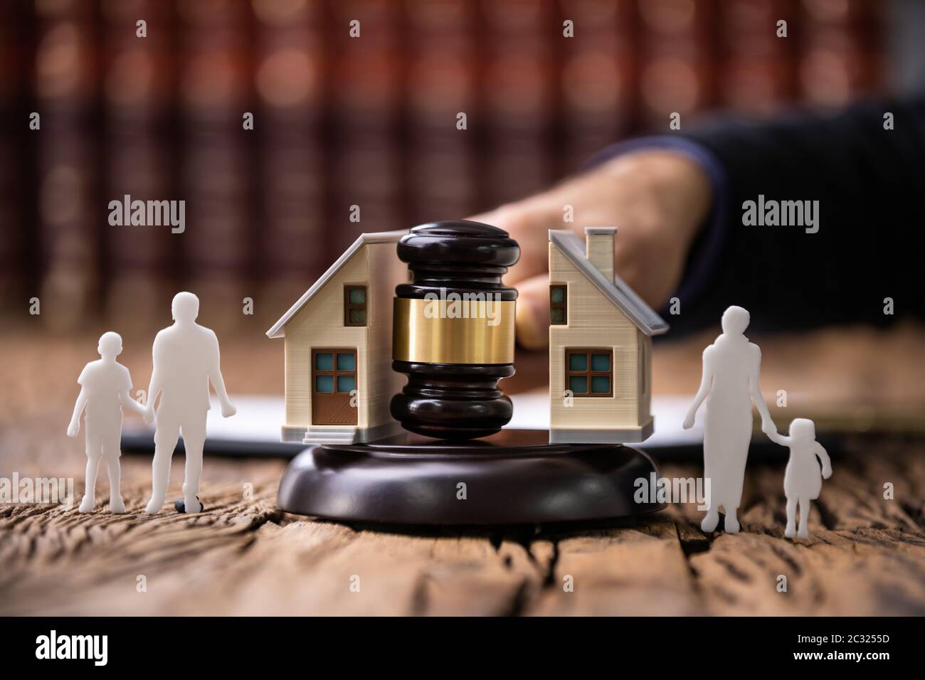 Close-up Of Mallet Showing Separation Of Family And House On Reflective ...