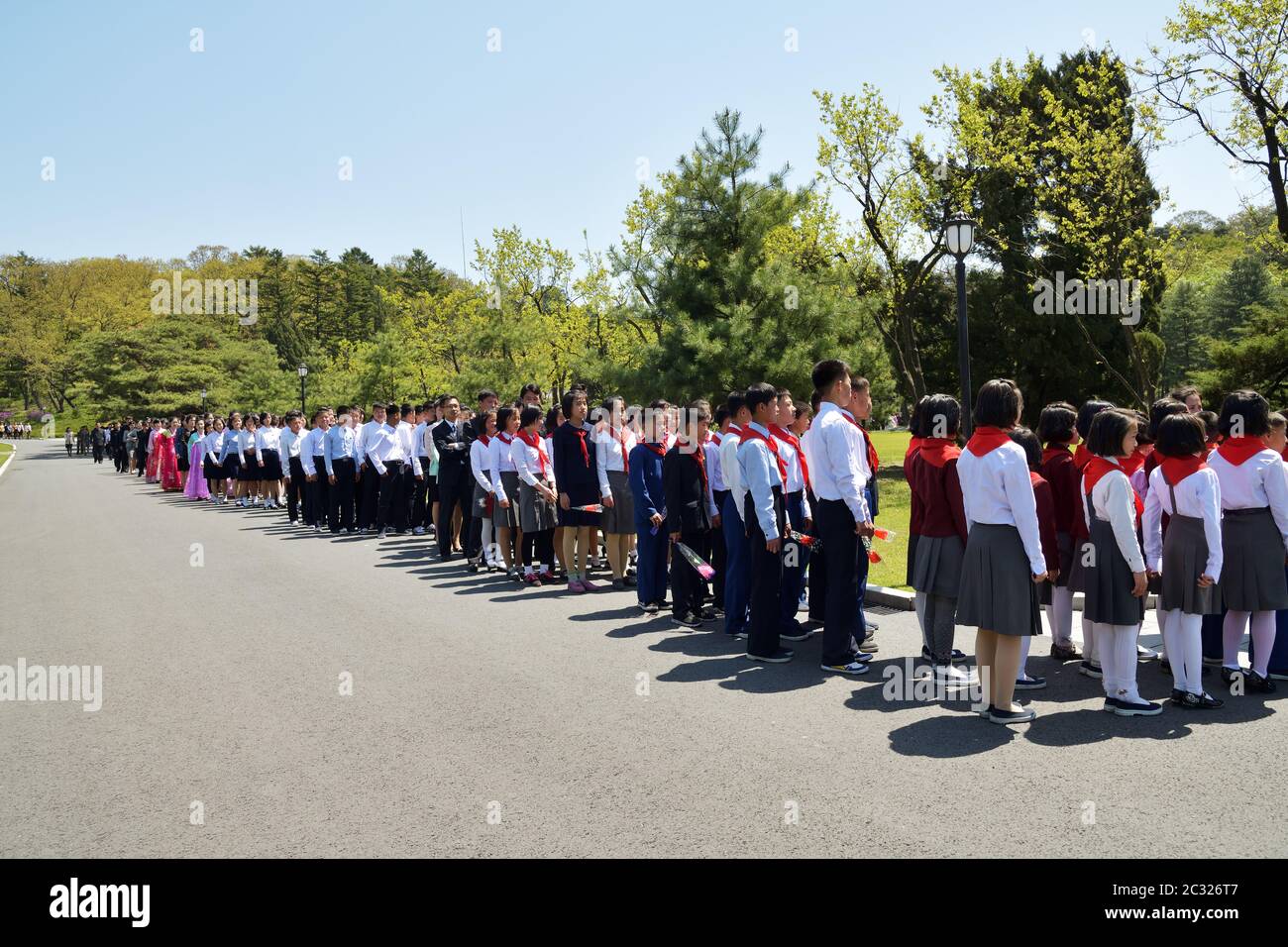 North Korea, Pyongyang - May 1, 2019: A group of North Korean peoples ...