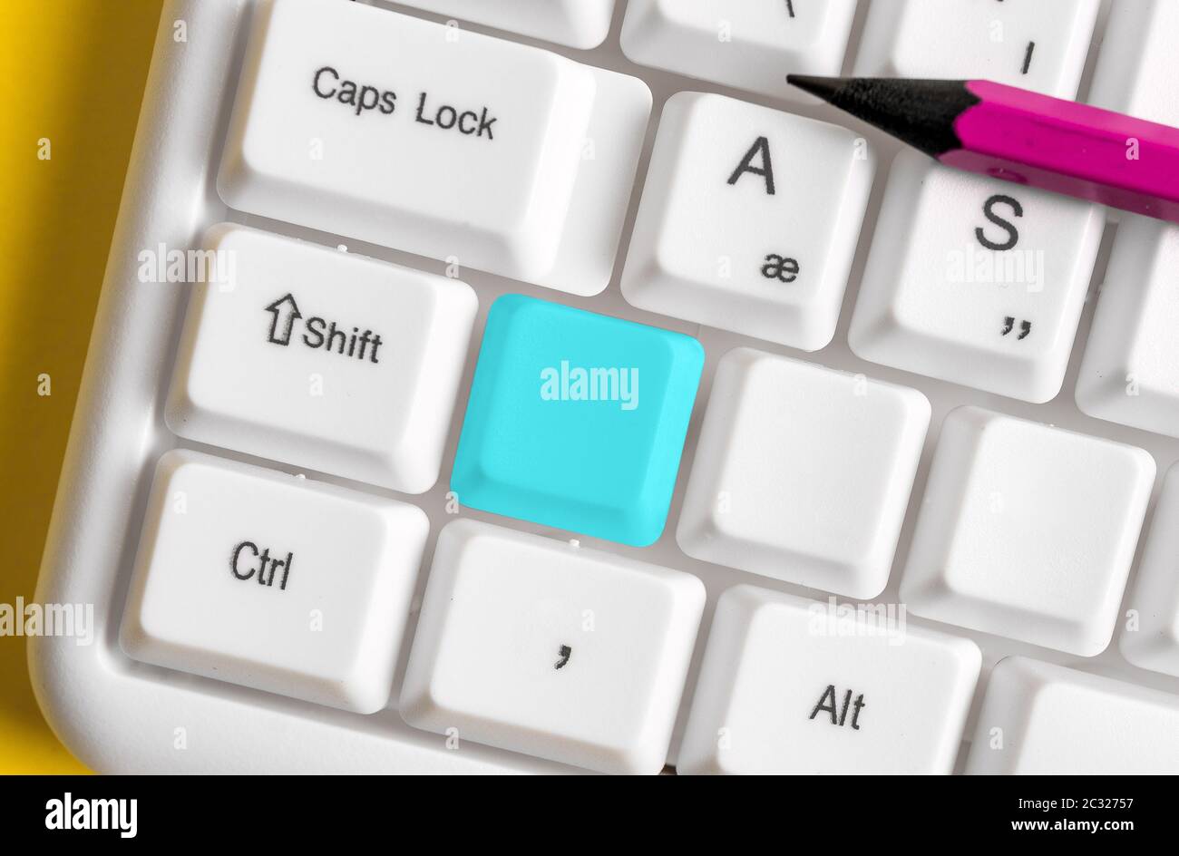 Different Colored Keyboard key With Accessories Arranged On Empty copy ...