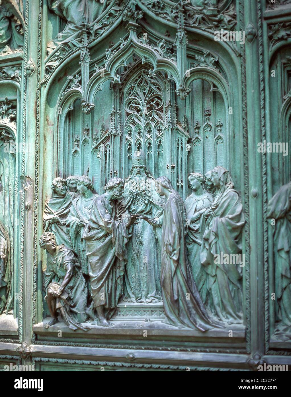Detail on bronze central door of Duomo di Milano (Milan Cathedral ...