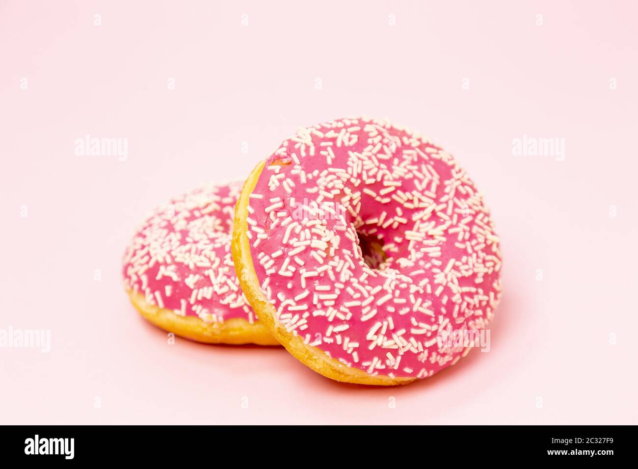 Pink sprinkle donut hi-res stock photography and images - Alamy