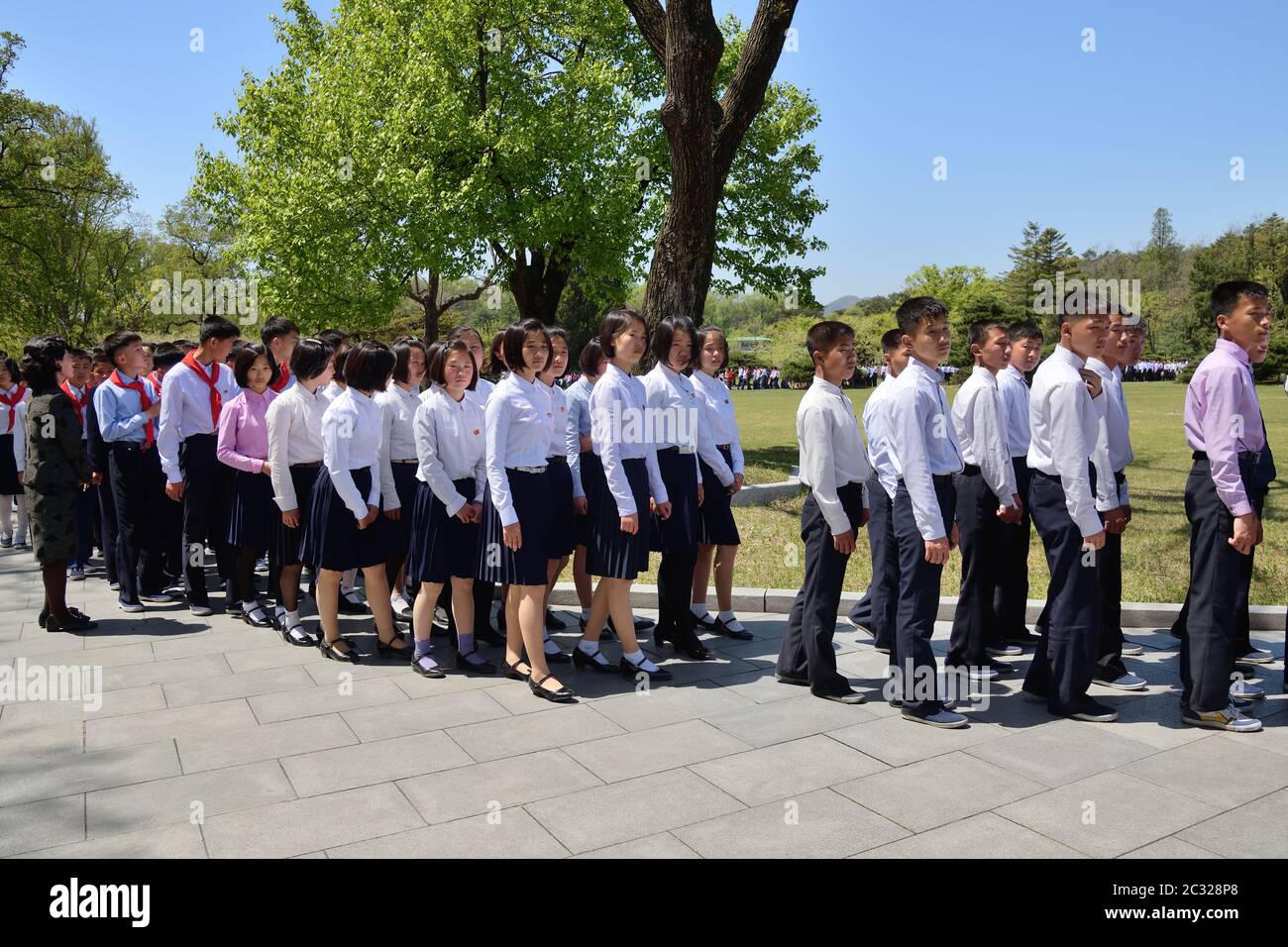 North Korea, Pyongyang - May 1, 2019: A group of North Korean peoples ...