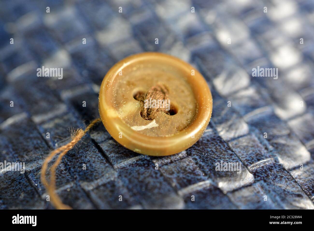 old brown sewing button image of a Stock Photo - Alamy