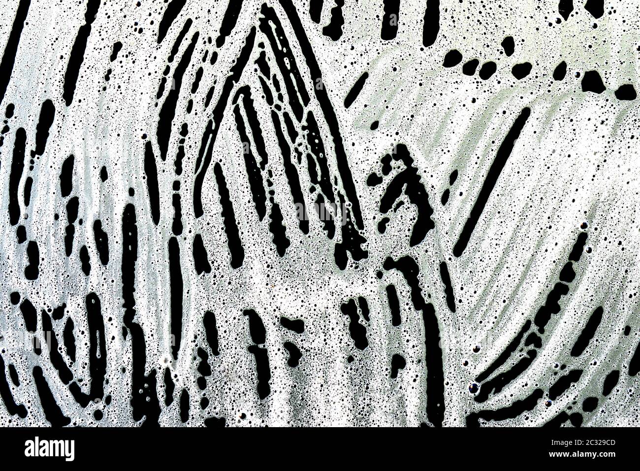 car wash foam patterns on a car window,image of a Stock Photo - Alamy