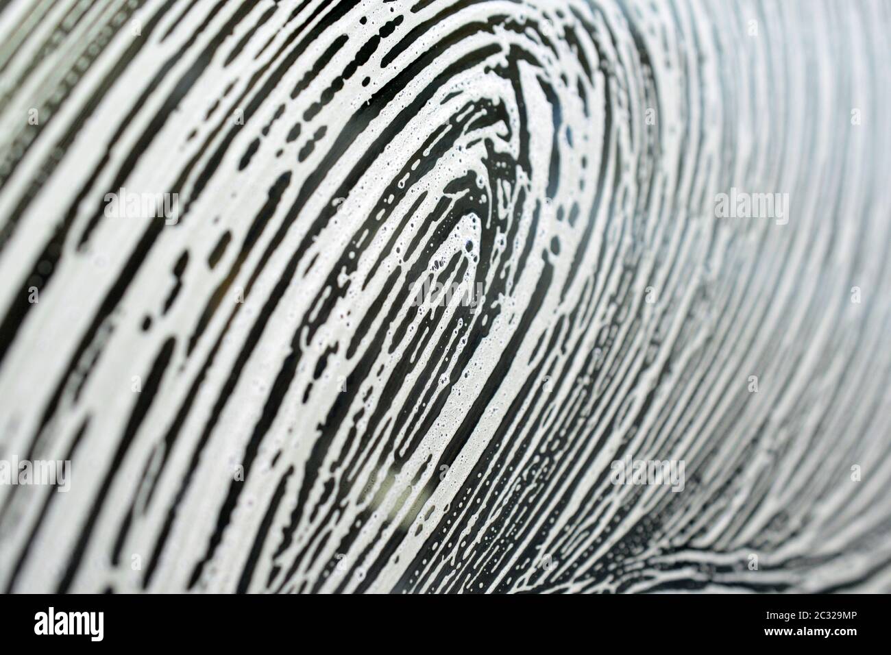 car wash foam patterns on a car window,image of a Stock Photo - Alamy