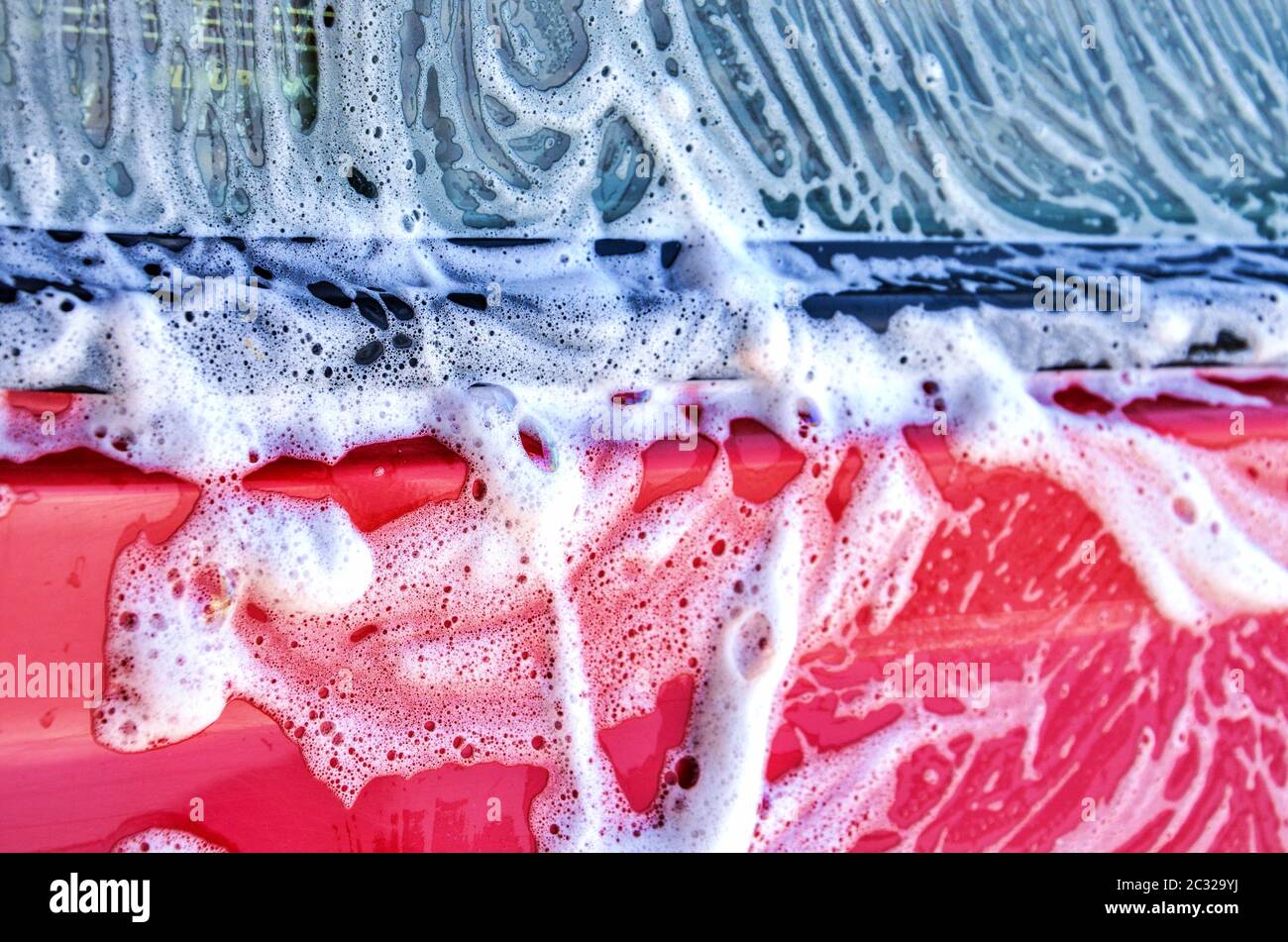 washing red car outdoor, image of a Stock Photo - Alamy