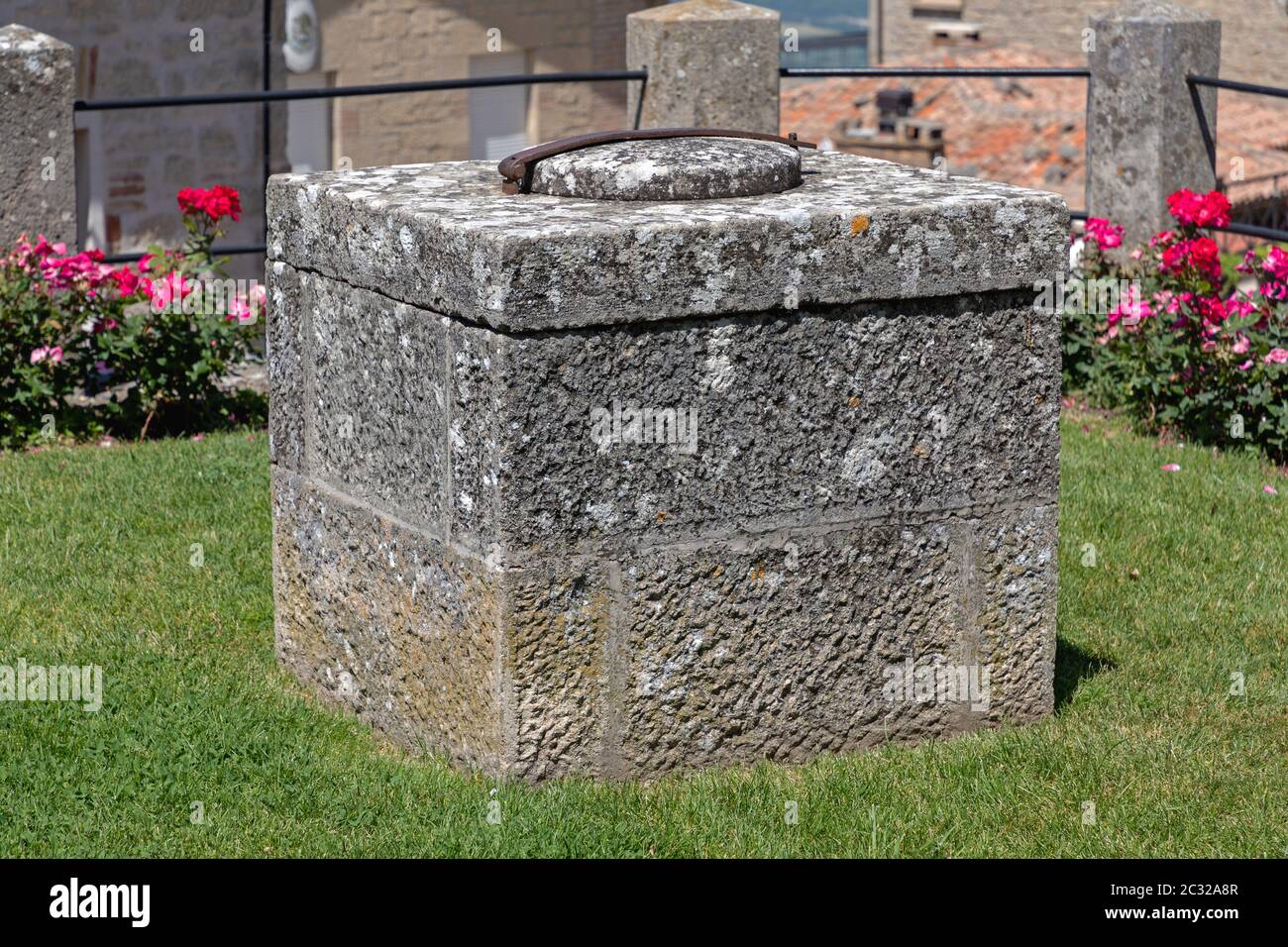 Big Stone Block Water Well in San Marino Stock Photo - Alamy