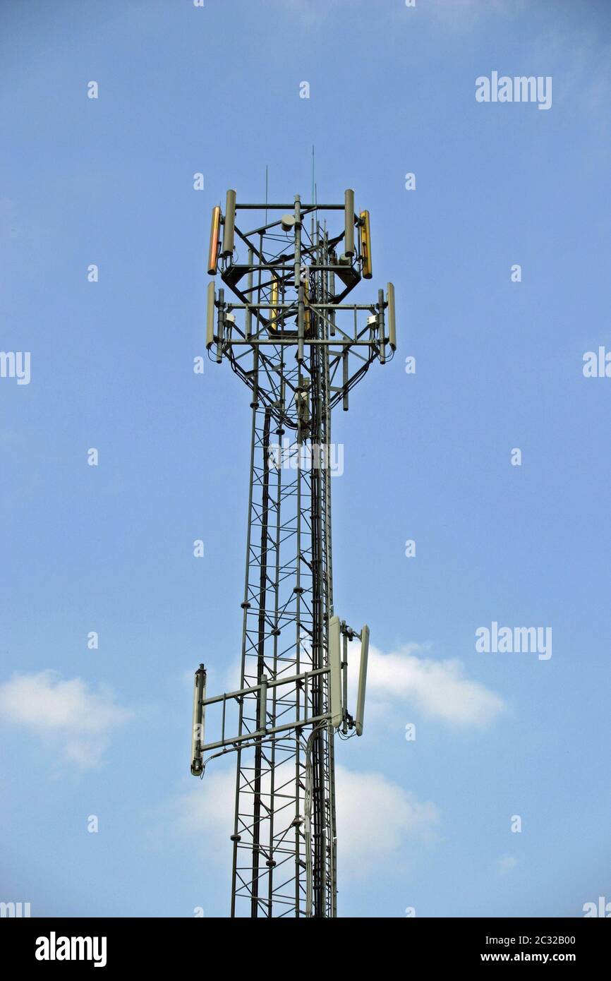 Telecommunications mast with various aerials for mobile phones ...