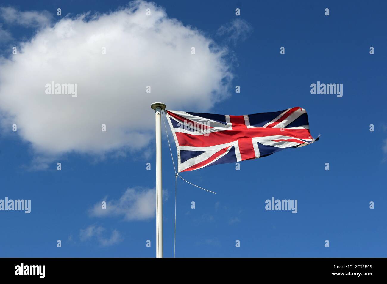 Union Jack national flag of the United Kingdom flying and fluttering in ...
