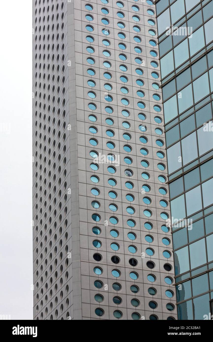 Modern Skyscraper Building With Many Round Windows in Hong Kong Stock ...