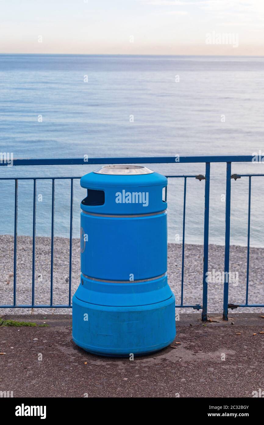 Big Blue Litter Bin at Nice Promenade France Stock Photo - Alamy