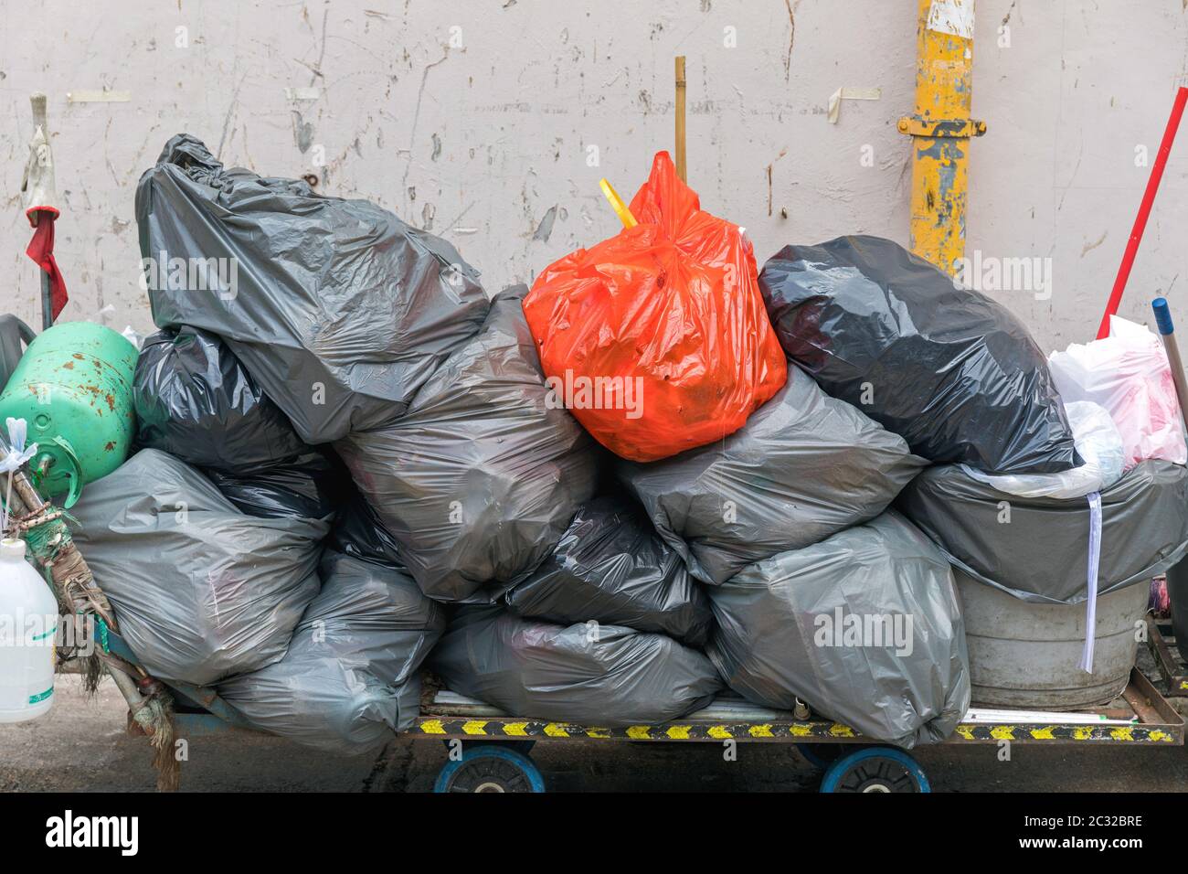 Pile of Garbage Bags Trash at Cart Stock Photo - Alamy