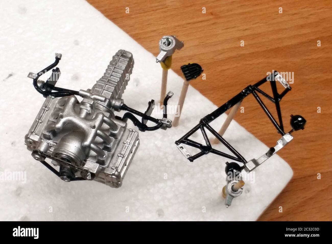 Dry painted plastic parts of cars. Engine, Gearbox, suspension elements ...