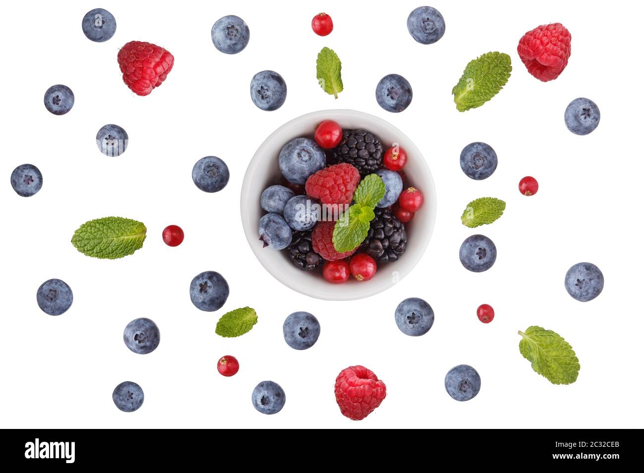 Mix of different berries isolated on white background Stock Photo - Alamy