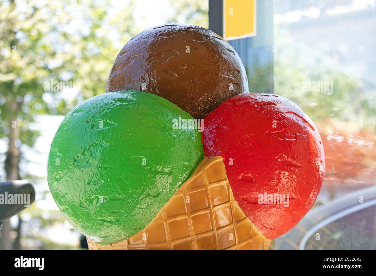 Three Big Scoops of Ice Cream in Cone Stock Photo - Alamy