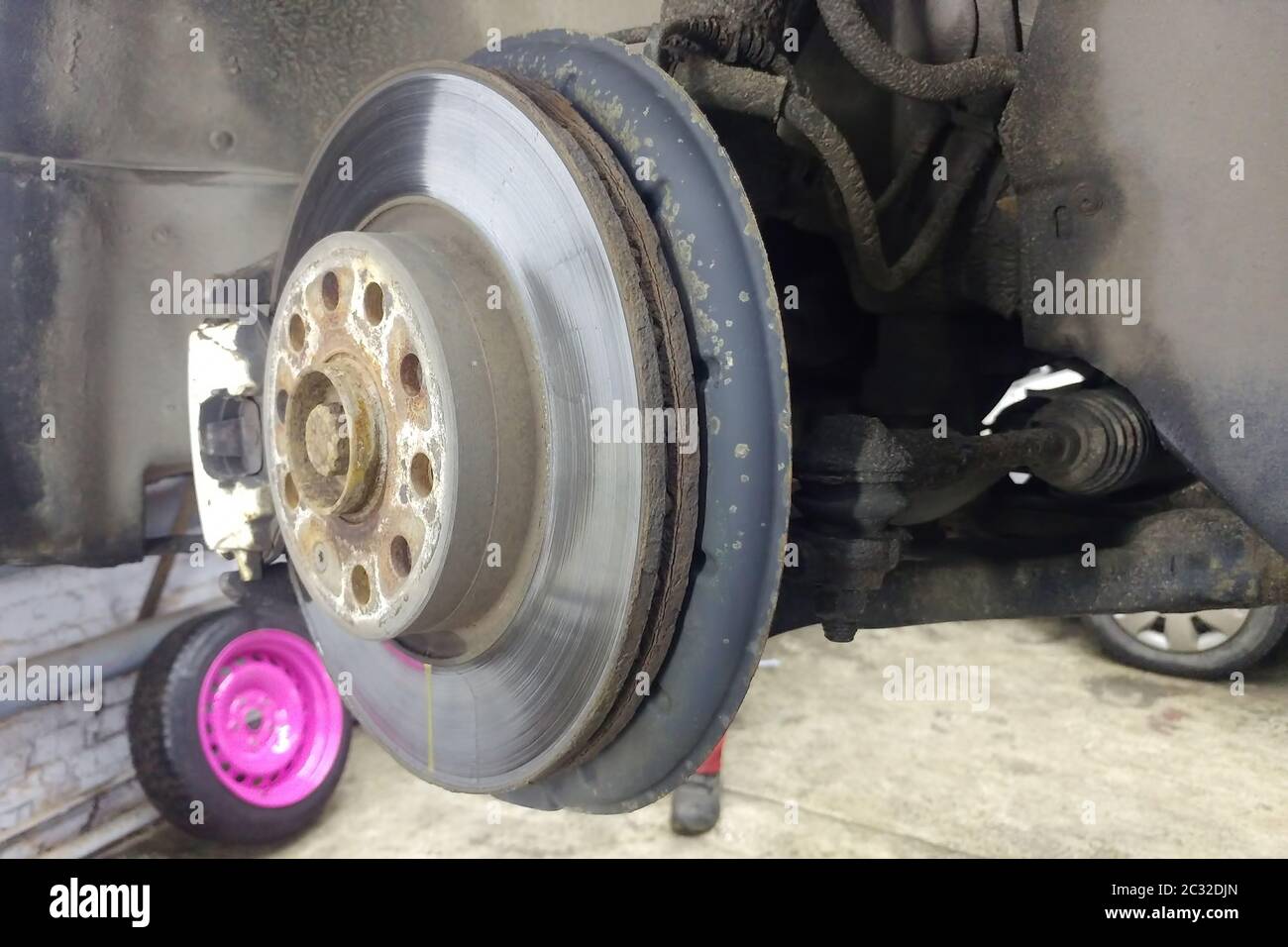 Heavily worn car brake discs. Replacing of brake mechanisms Stock Photo ...