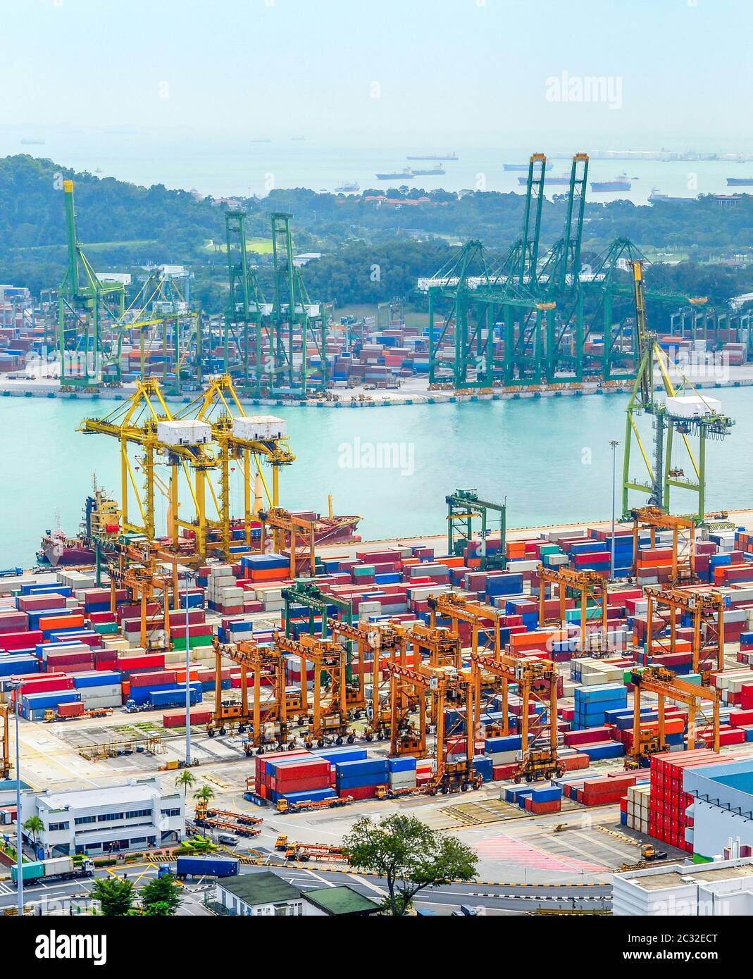 Aerial view of Singapore trade port, heavy equipment, cargo containers ...