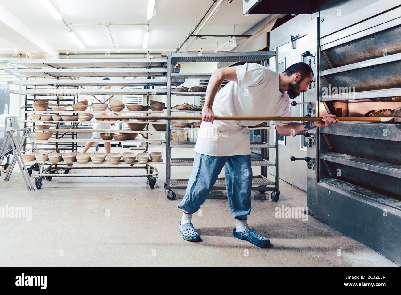 Turning the bread hi-res stock photography and images - Alamy