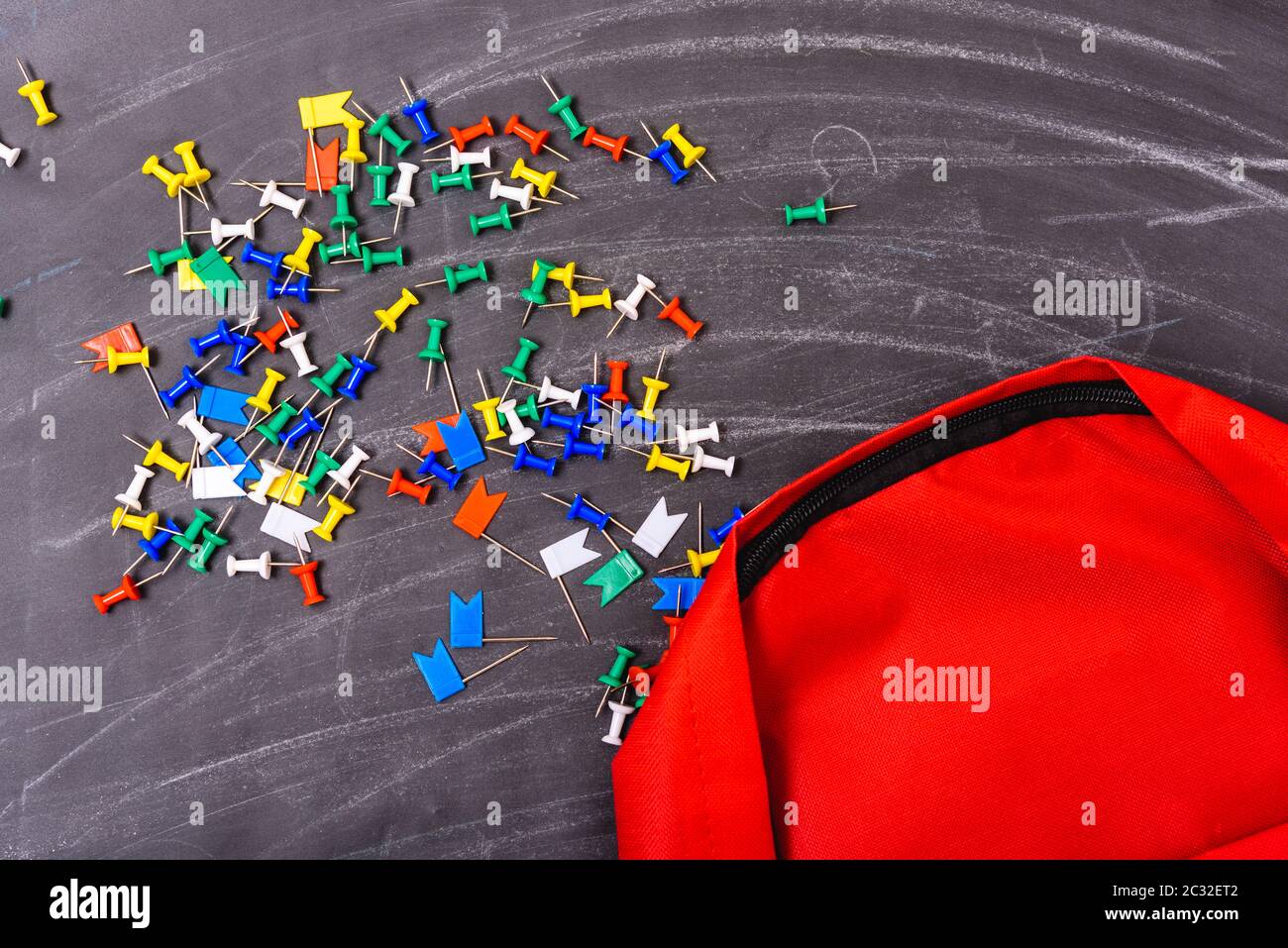 Back to school shopping backpack, on photo have red bag and colorful ...