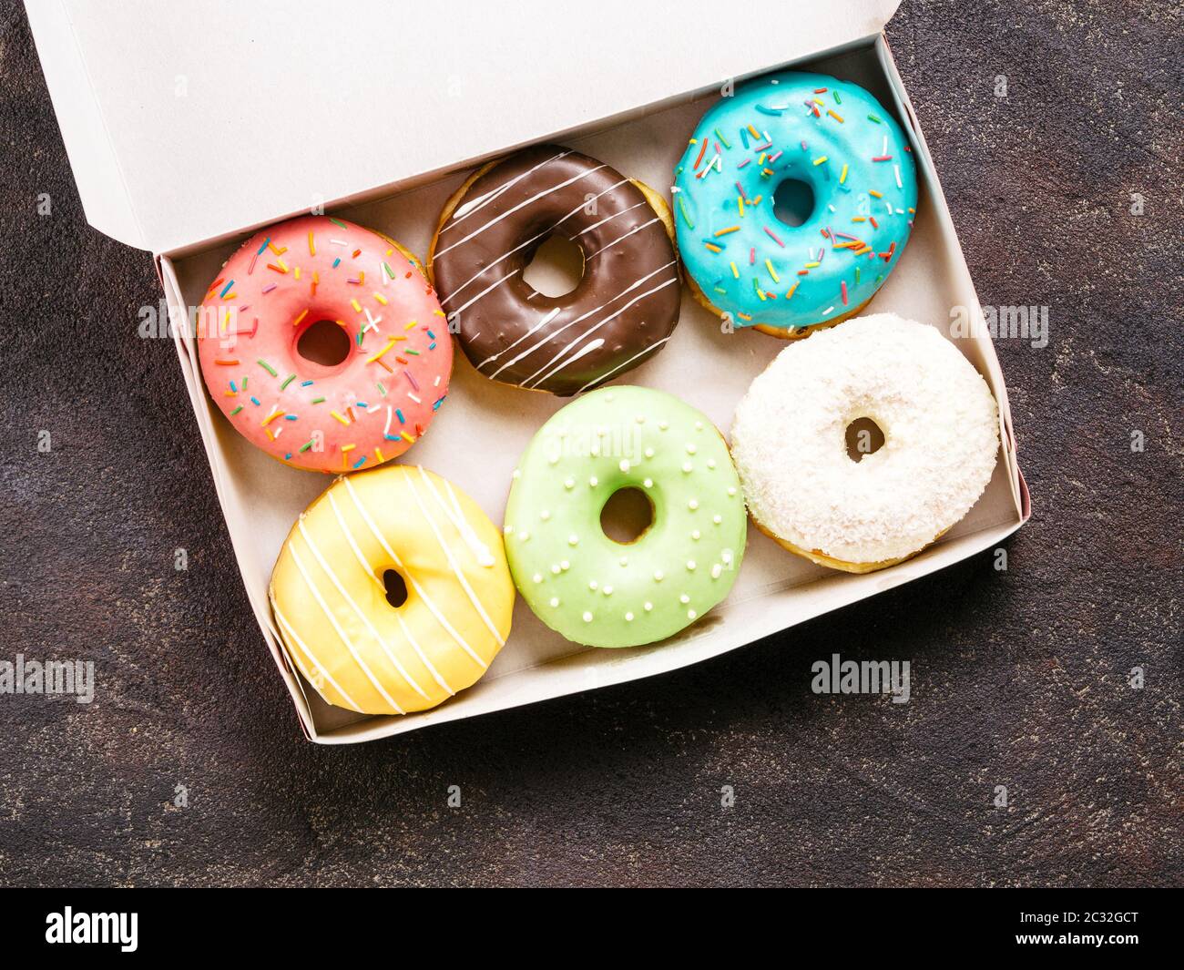 paper box with colorful donuts, top view, copy space Stock Photo - Alamy