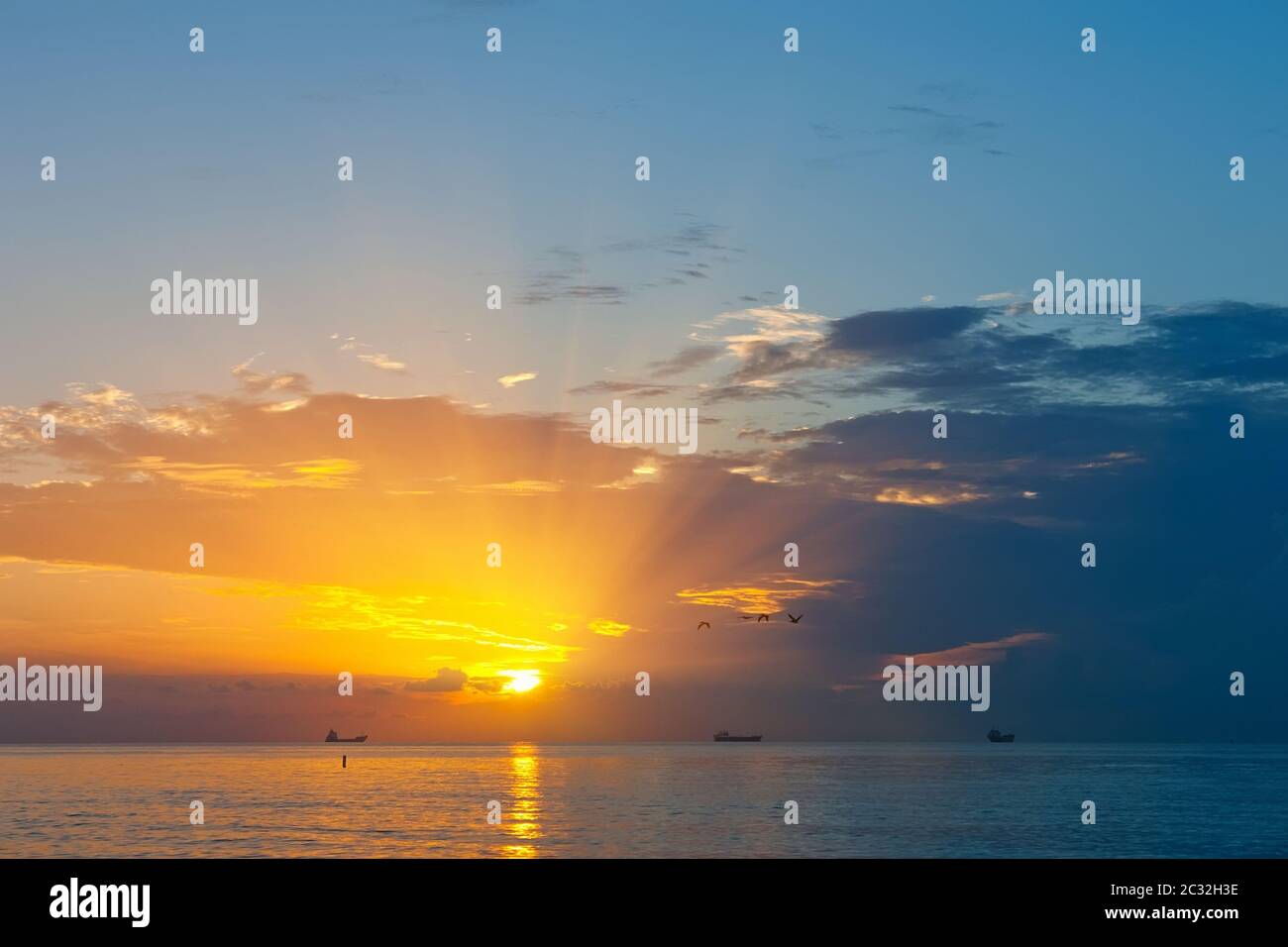 Sunrise over Atlantic ocean Stock Photo - Alamy