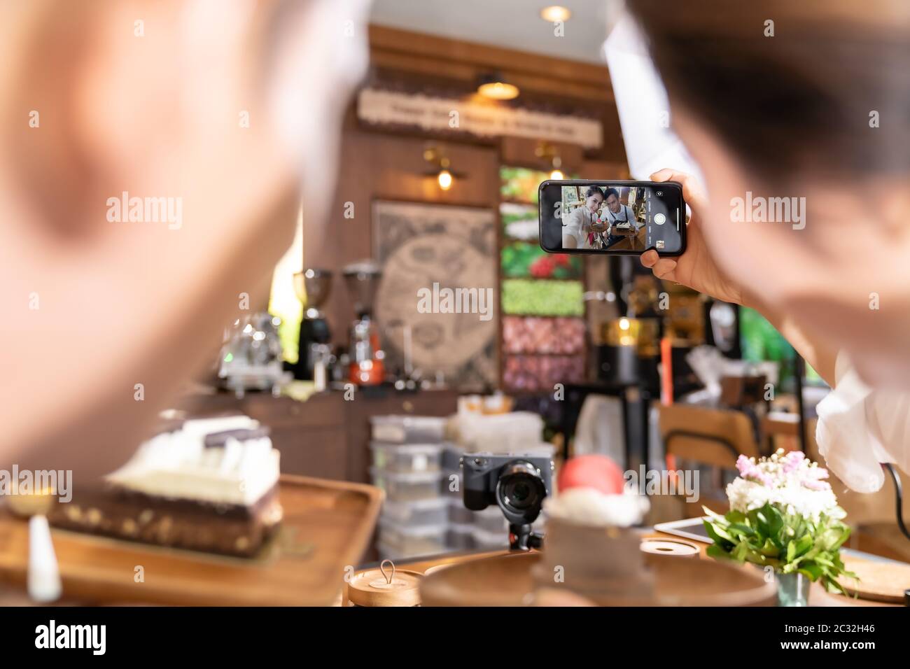 Cafe owner live their cafe. Rear View Stock Photo - Alamy
