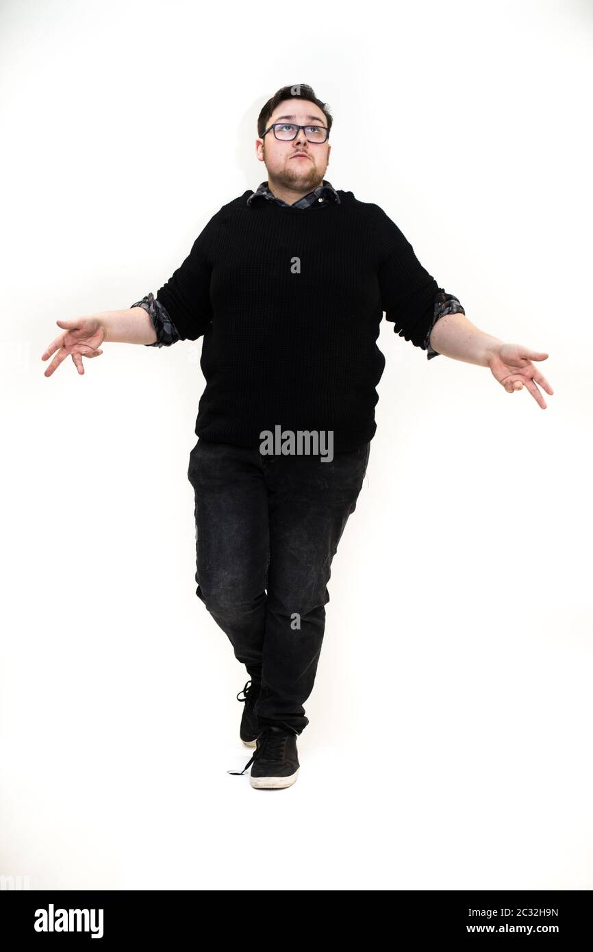A young man posing on a white background Stock Photo - Alamy