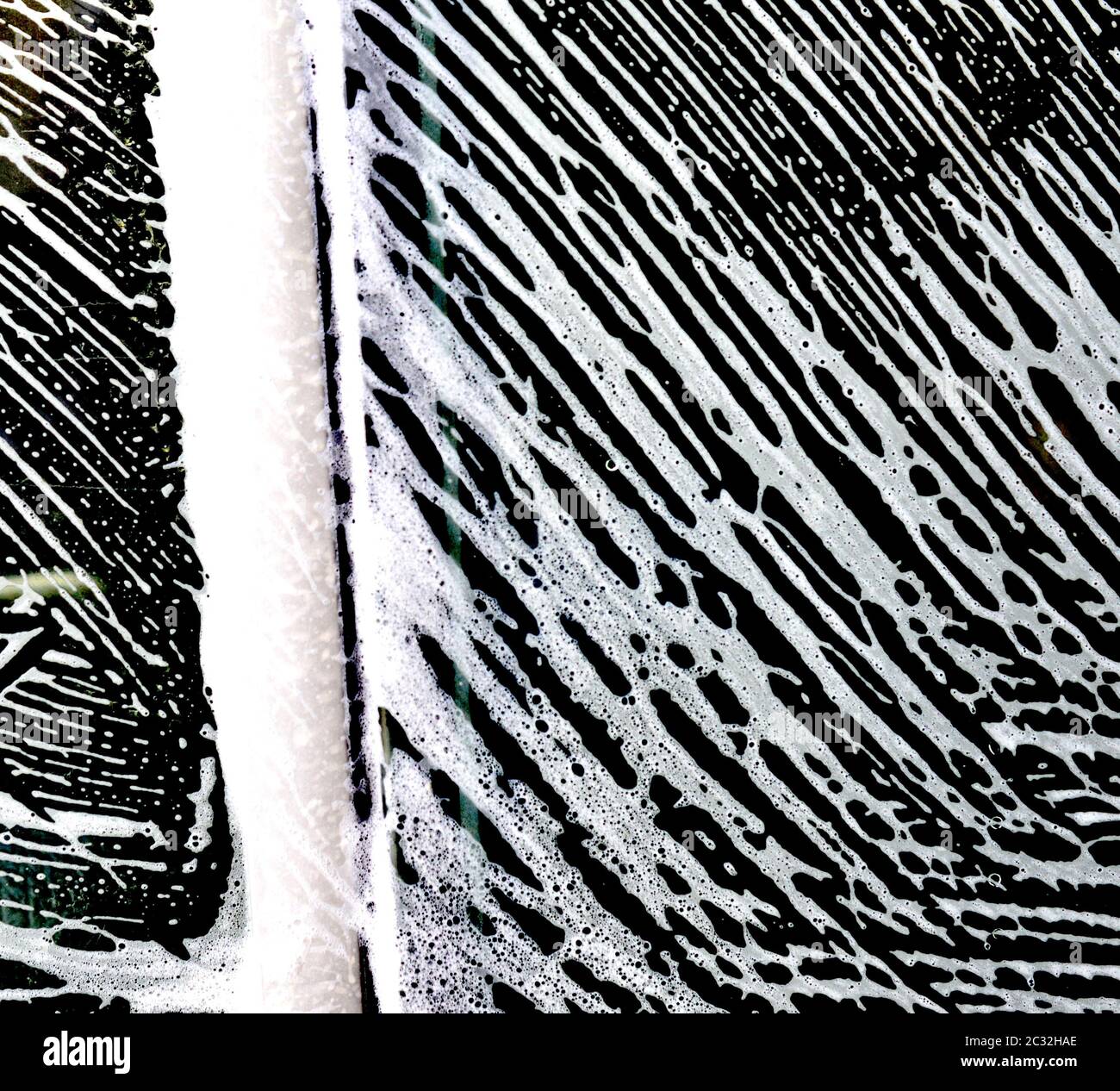 car wash foam patterns on a car window,image of a Stock Photo - Alamy