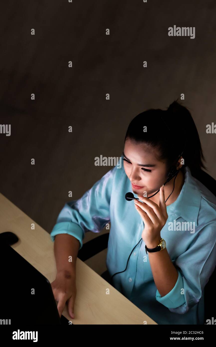 Call center working top view night Stock Photo - Alamy