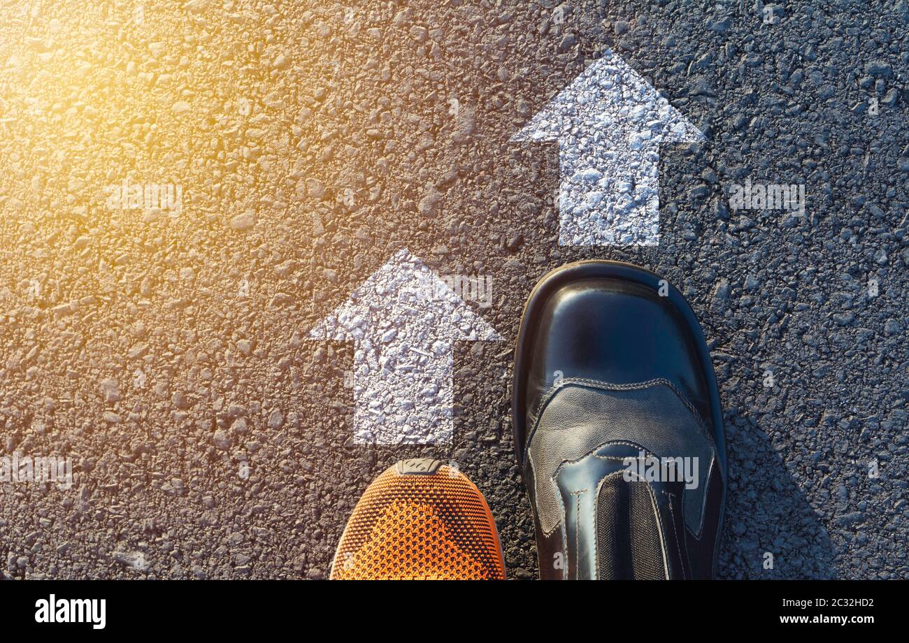 Shoes standing at the crossroad and get to decision which way to go ...