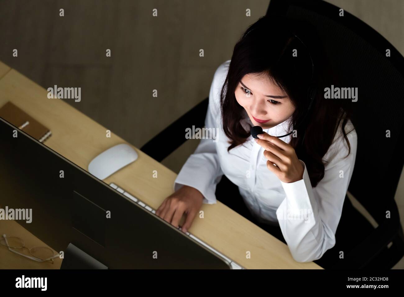 Call center working top view night Stock Photo - Alamy
