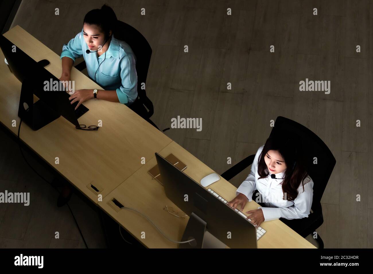 Call center team working top view night Stock Photo - Alamy