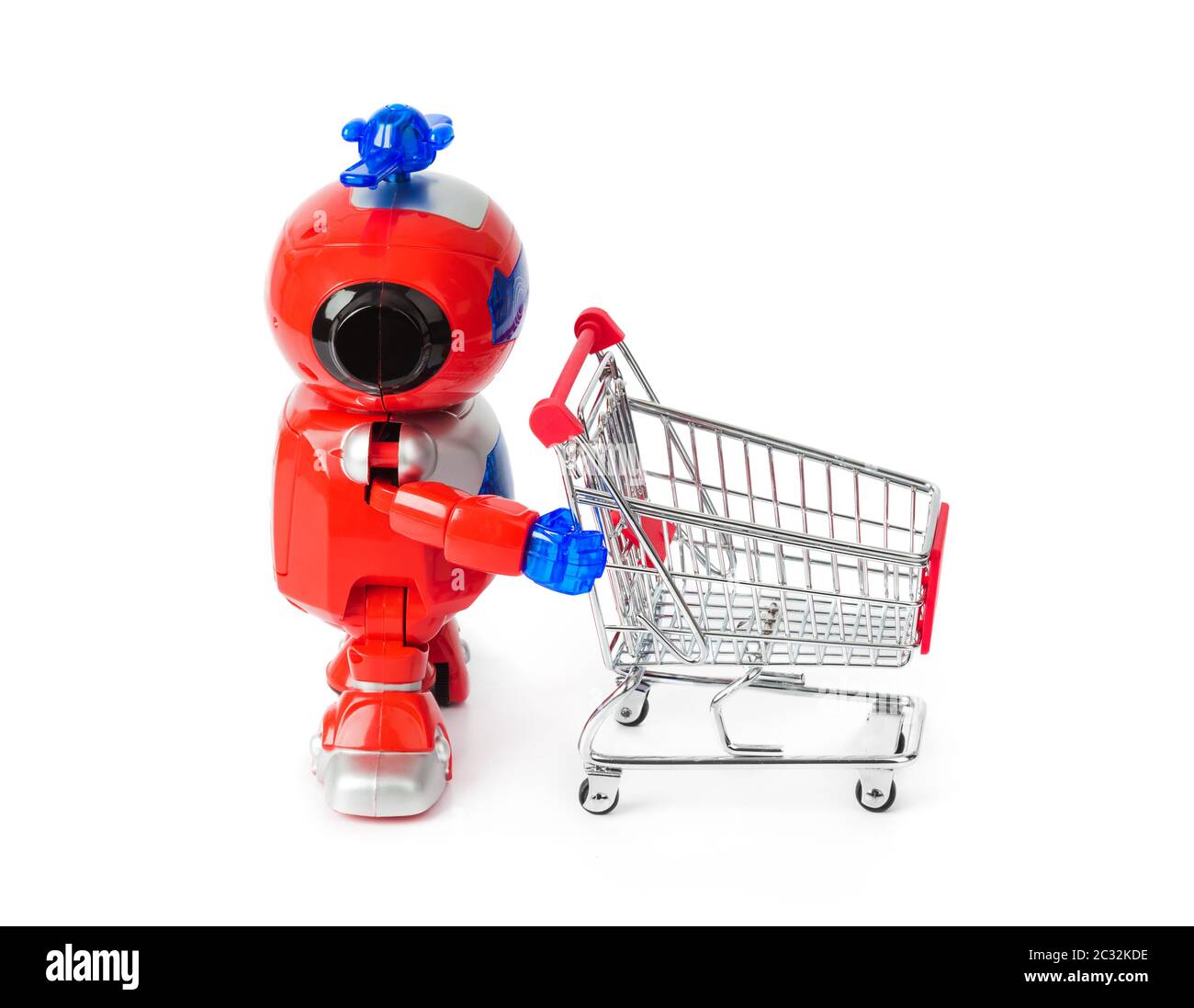 Toy robot and shopping cart Stock Photo - Alamy