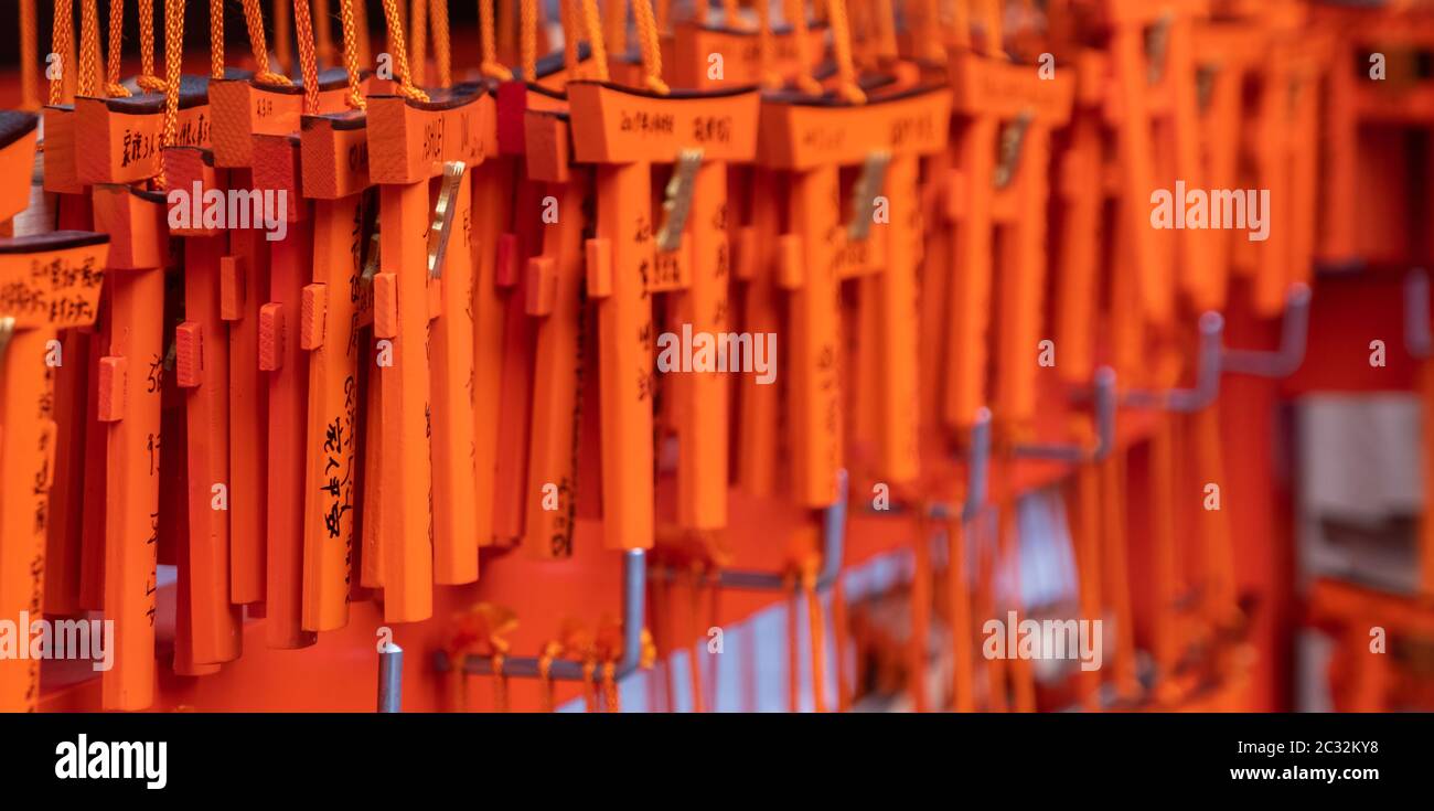 Ema or small wooden plaques written with prayer wish torii (traditional ...