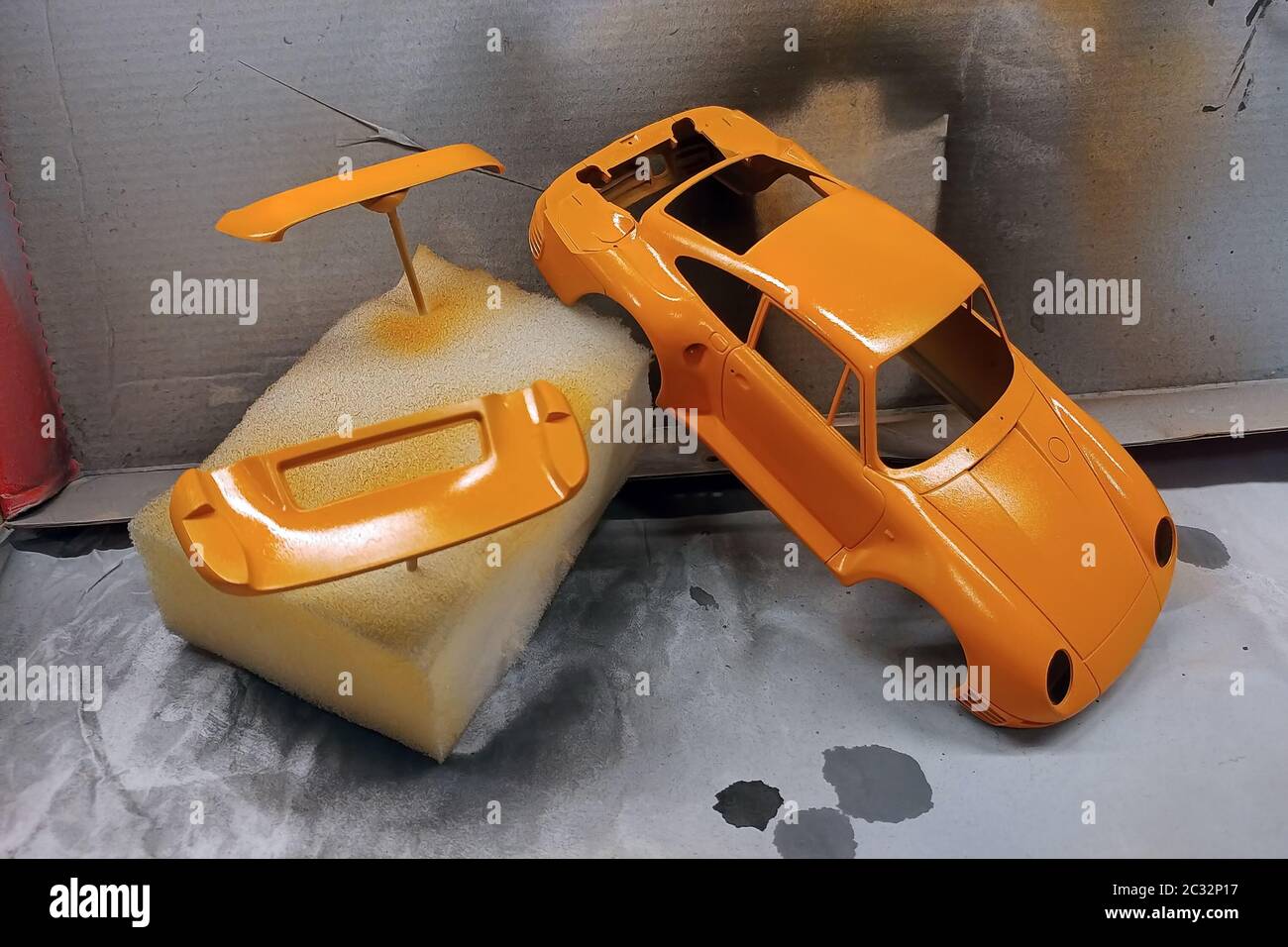 Modeling scale models. Paint the spoiler, trunk lid and toy body in a ...