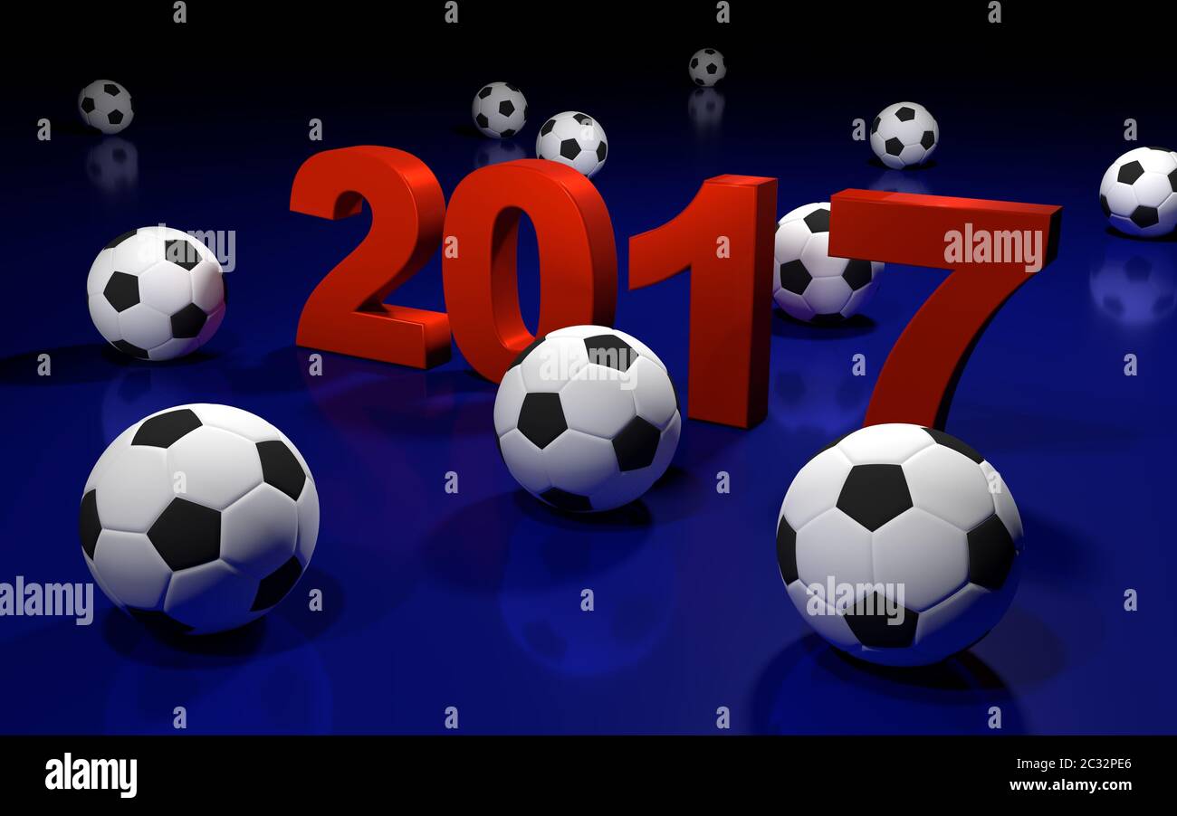 Several football balls and number 2017 on the dark background with ...