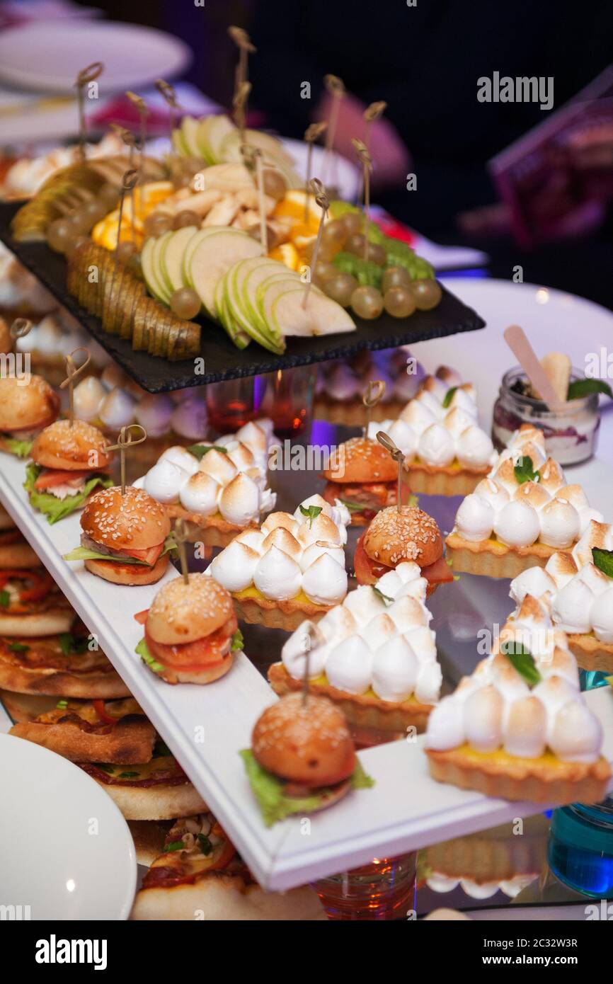 Catering food table set concept Stock Photo - Alamy
